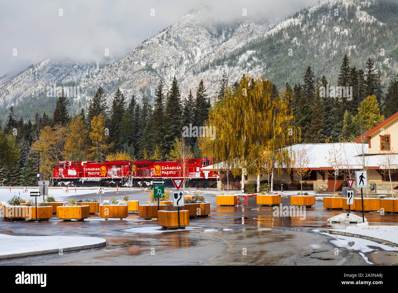 Bright red Canadian Pacific Locomotives at the railway station in Banff ...