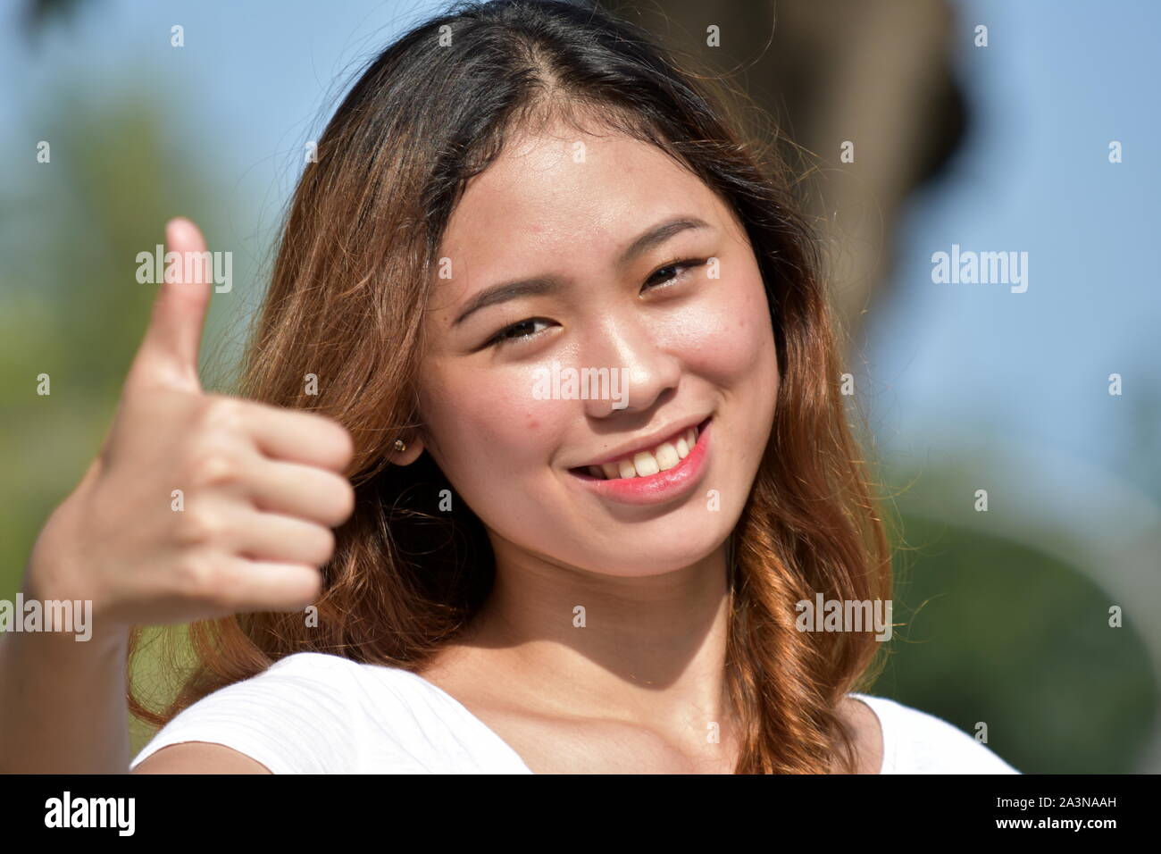 Female With Thumbs Up Stock Photo - Alamy