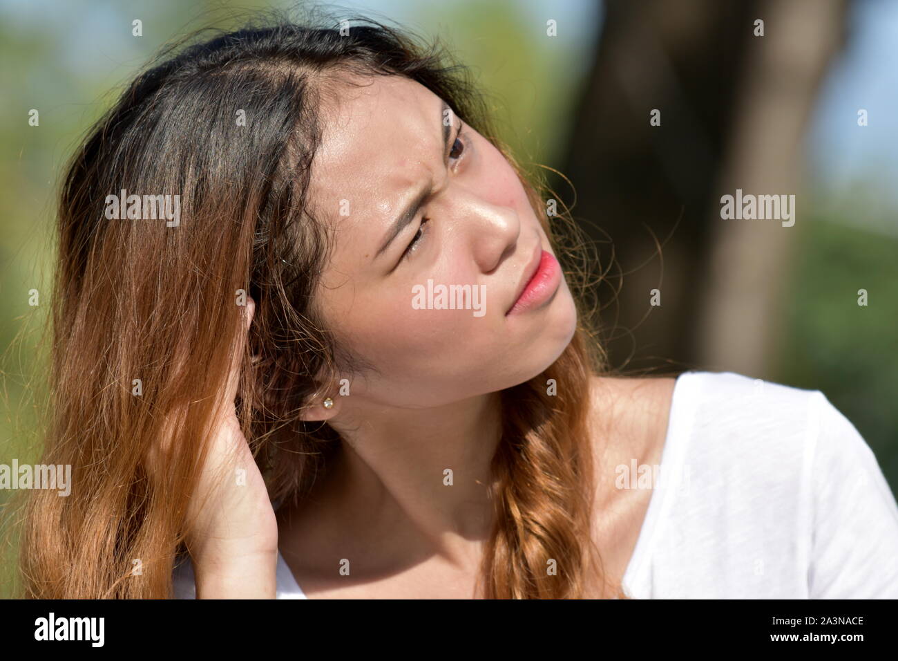Worrisome Youthful Asian Adult Female Stock Photo - Alamy