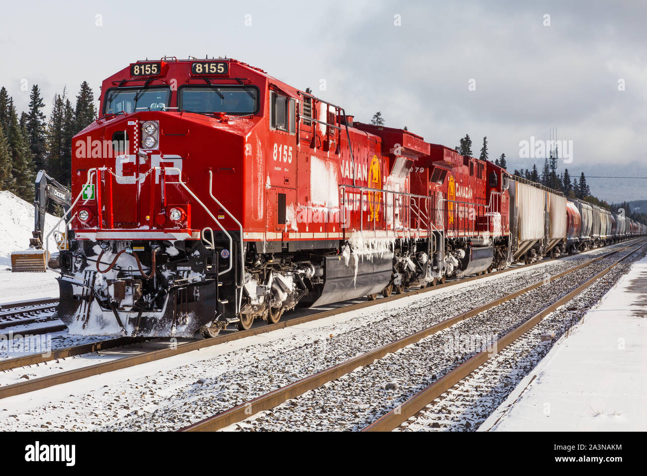 Bright red Canadian Pacific Locomotives at the railway station in Banff ...