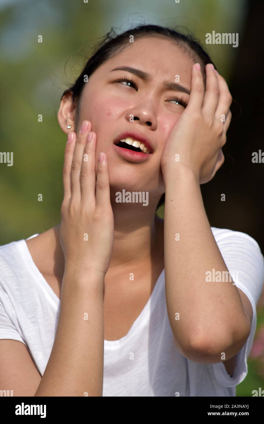 Young Filipina Female Under Stress Stock Photo - Alamy