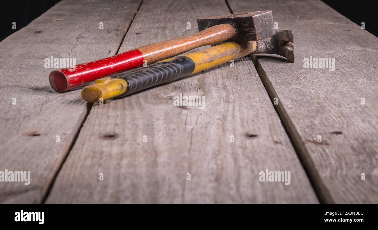 closeup construction hammer on wooden planks in studio Stock Photo - Alamy