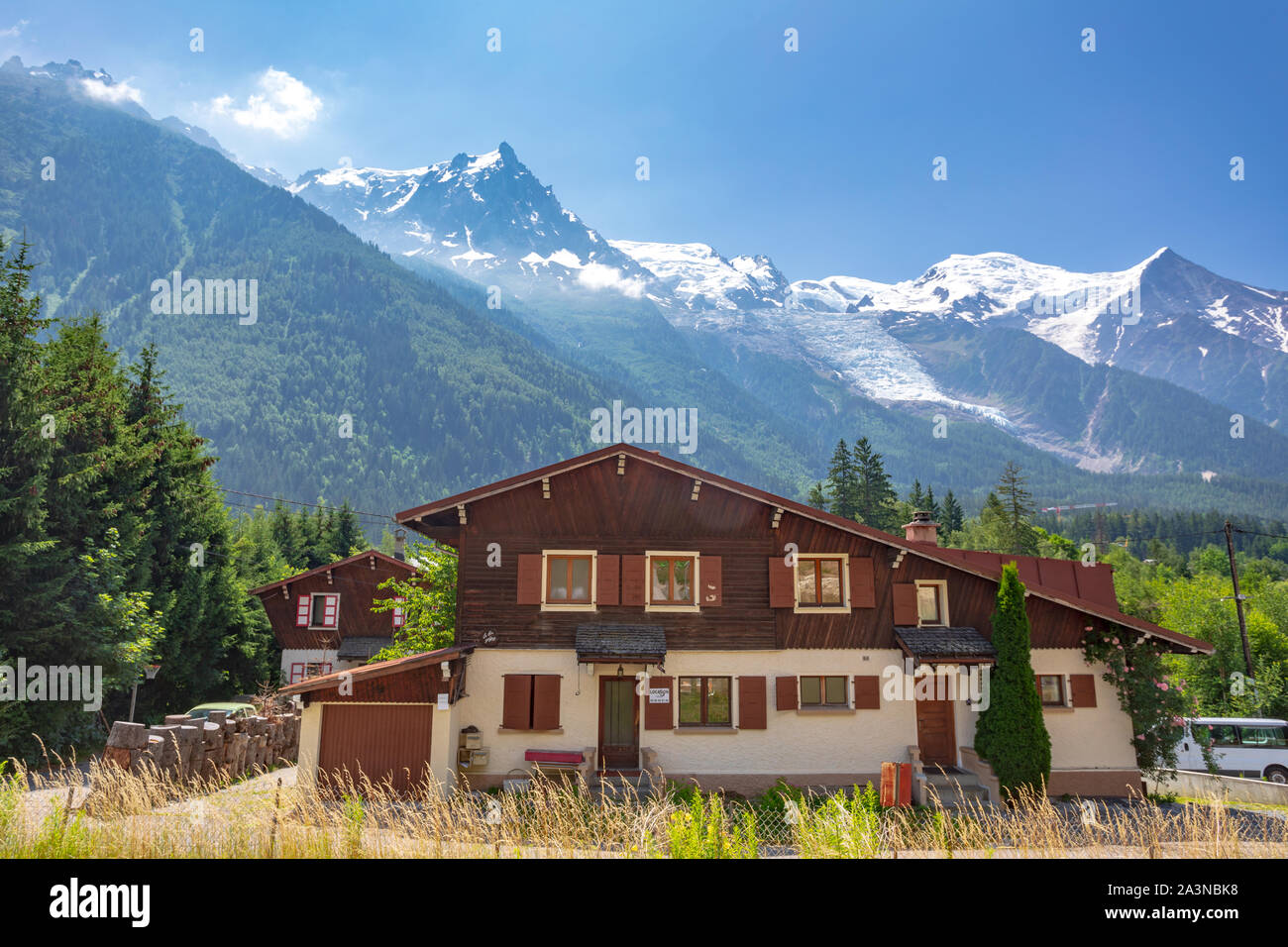 Wooden cottage with Mont Blanc mountain in background in Chamonix ...