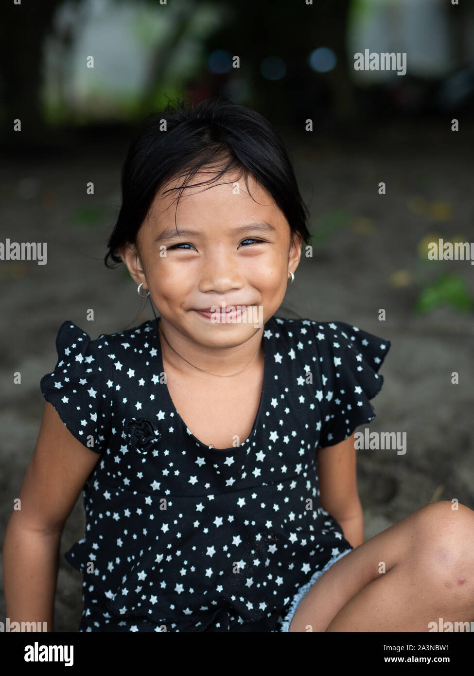 Smiling portrait of an Asian little girl from the Philippines Stock ...
