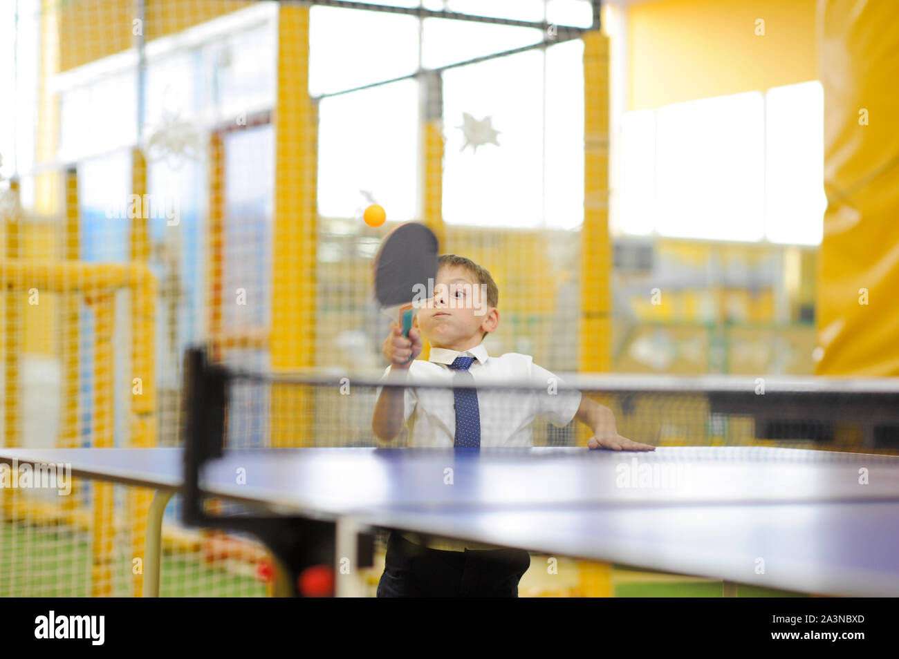Boy playing ping pong table tennis hi-res stock photography and images ...