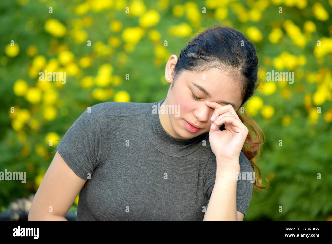 Tearful Asian Person Stock Photo - Alamy