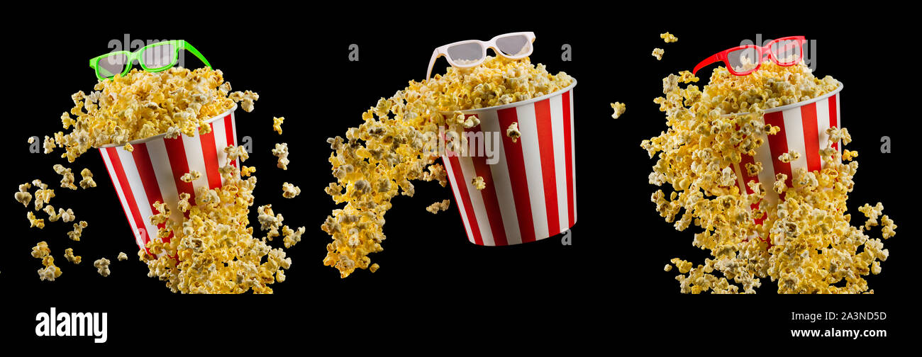 Set of buckets with popcorn and 3D glasses isolated on black background Stock Photo - Alamy