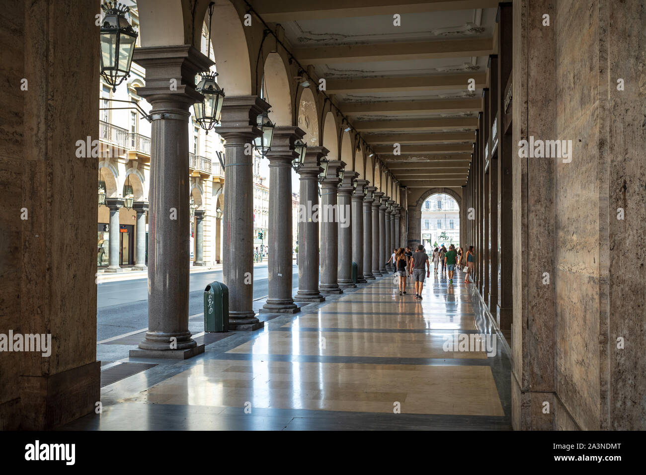 Street arcades and arches on Via Roma who is the main street which runs ...