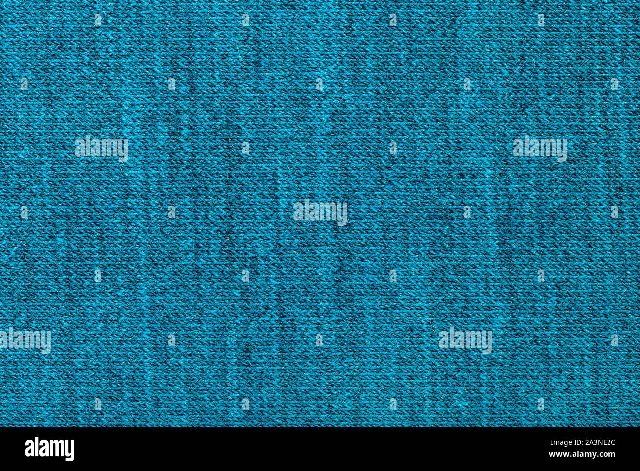 textile background - weaving of threads in wool jersey knitted fabric ...