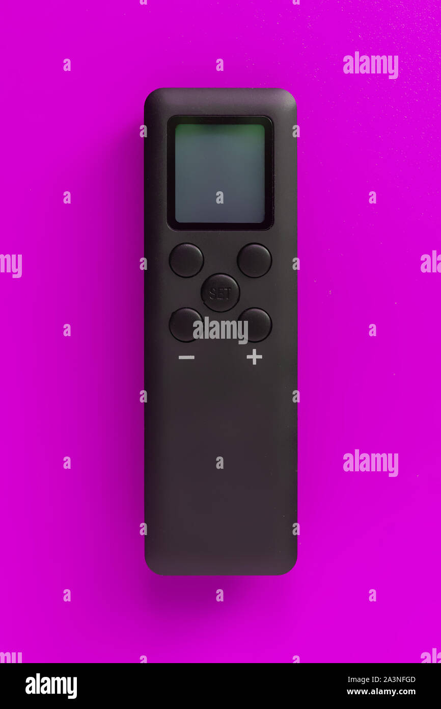 simple remote wireless controlle on the color background isolated top ...