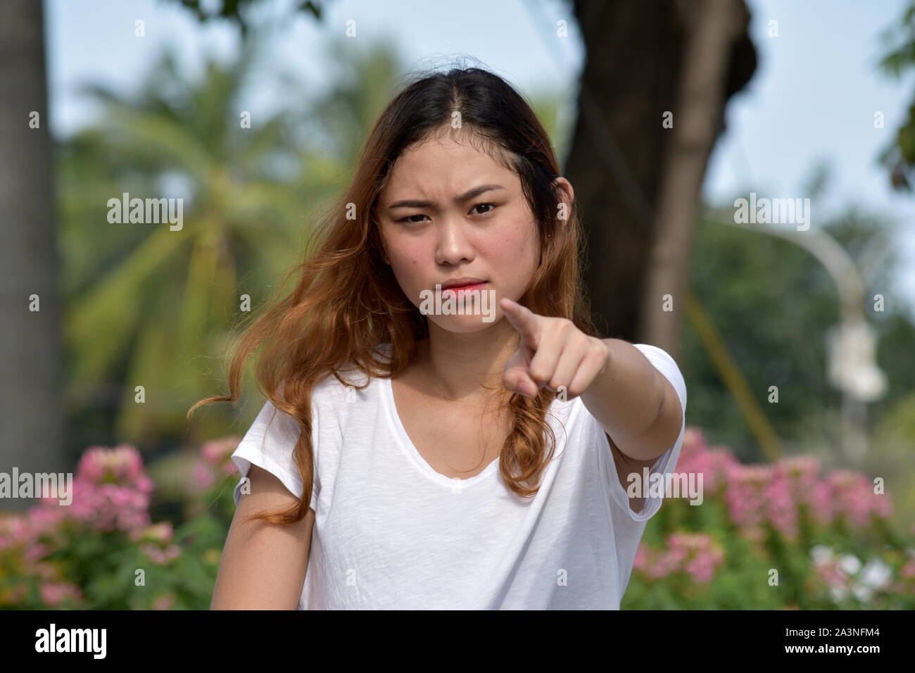 Beautiful Woman Pointing Stock Photo - Alamy