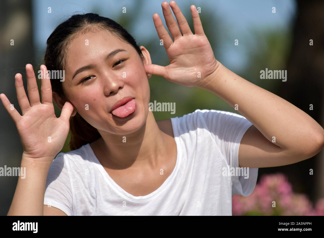 Youthful Filipina Female Making Funny Faces Stock Photo - Alamy