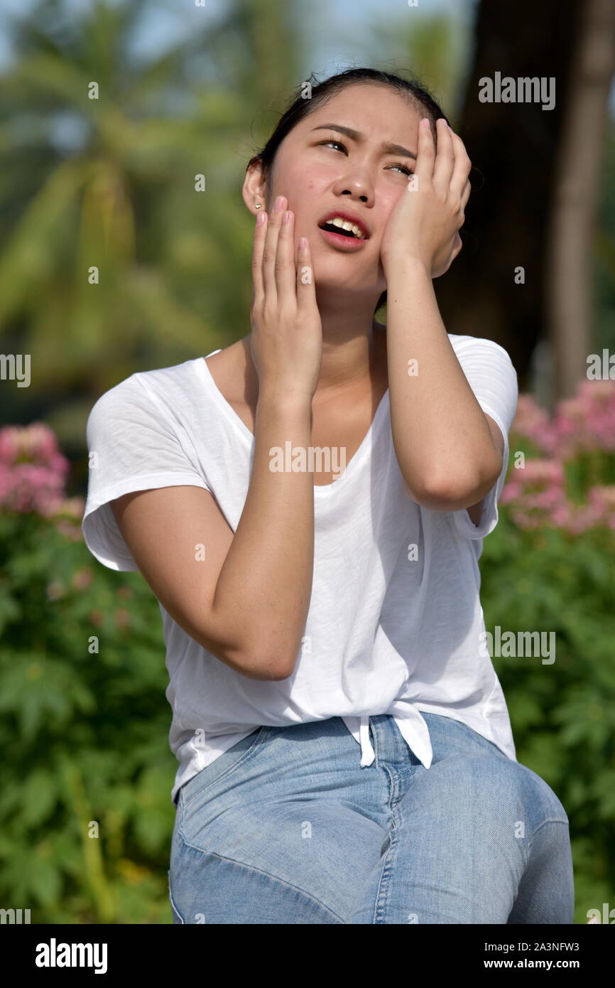 An Anxious Filipina Female Stock Photo - Alamy