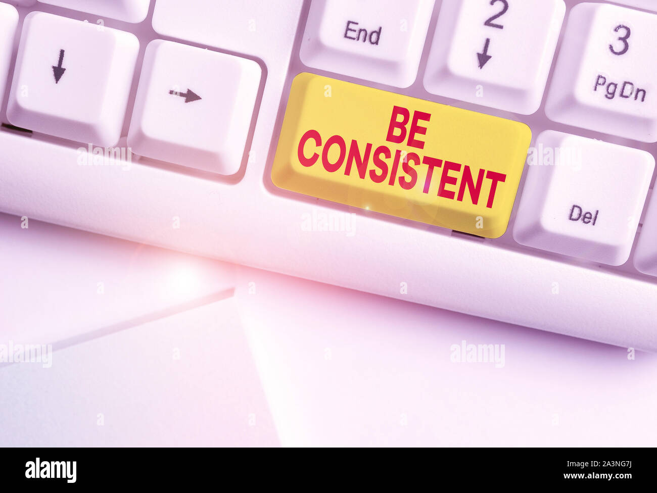 Writing note showing Be Consistent. Business concept for Uniform ...