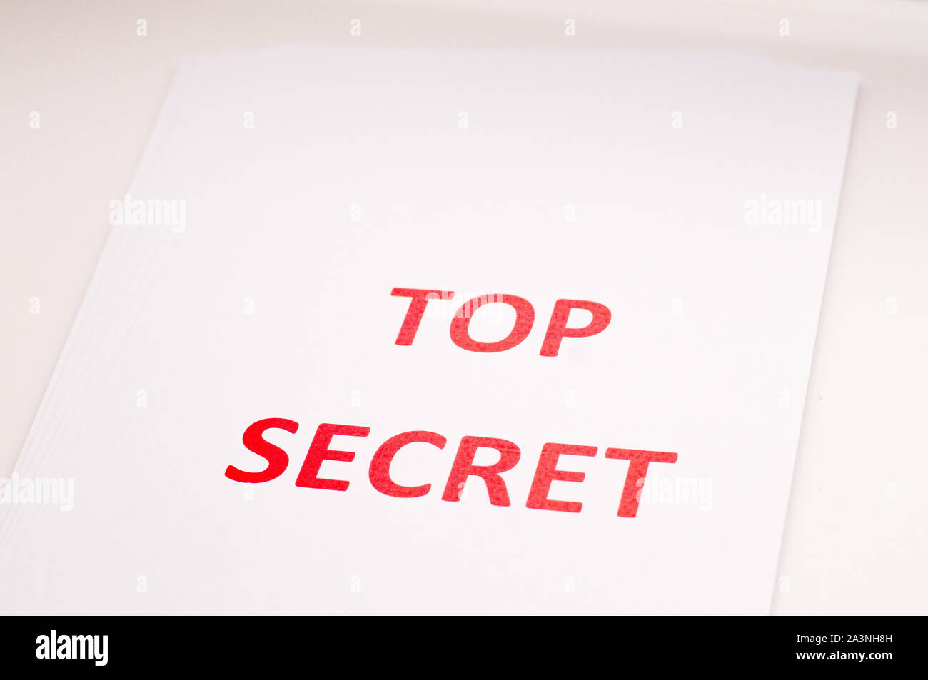 Red inscription TOP SECRET on a white sheet. Secrets and conspiracies ...