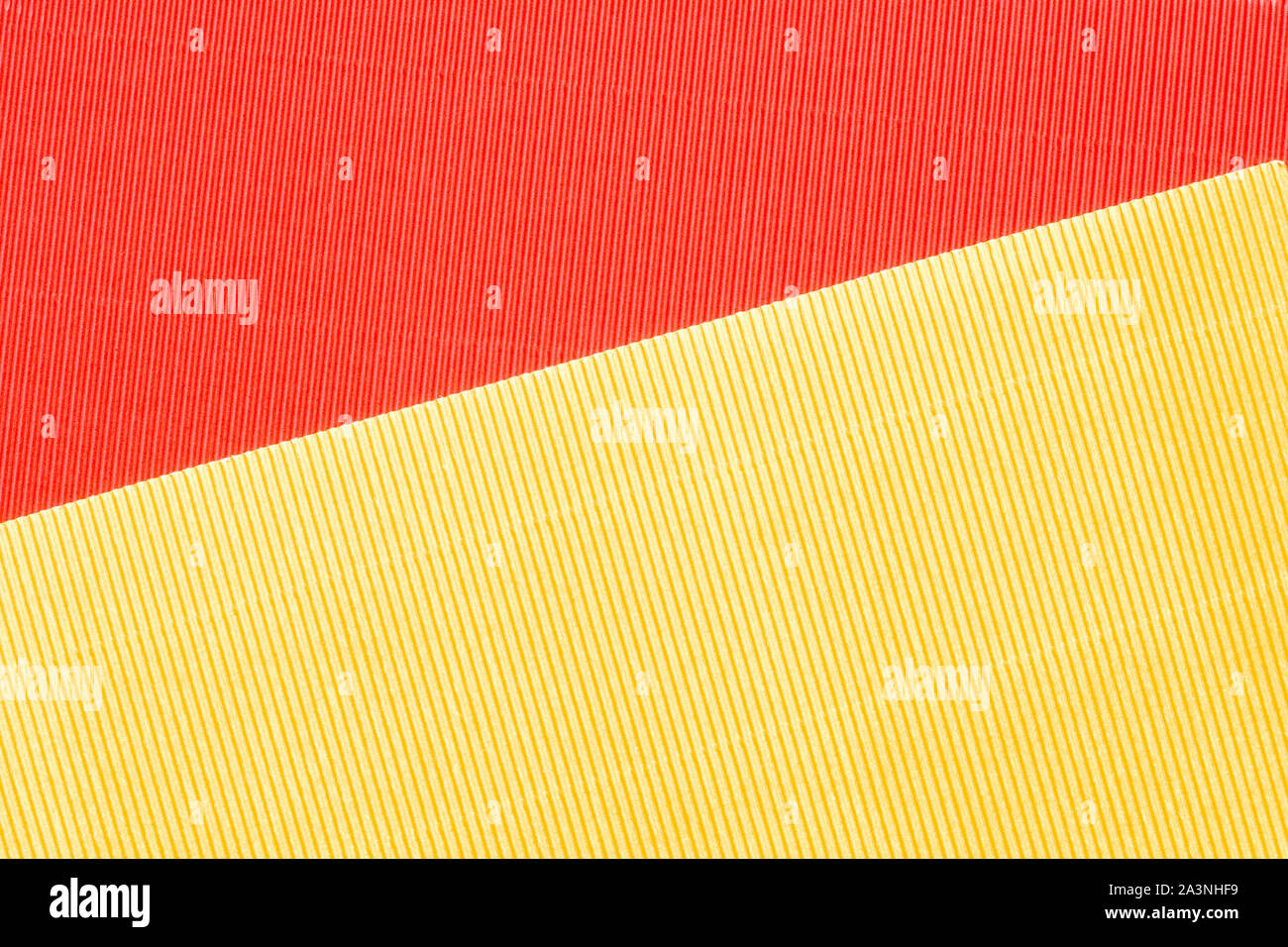 Sheets of colored embossed paper. Laid one on top of the other ...