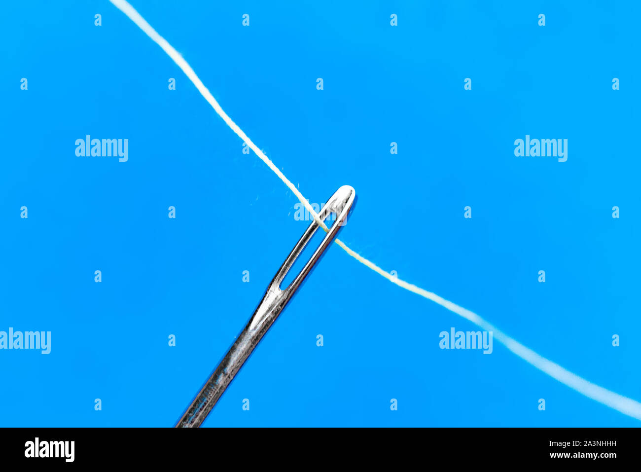 Through string hole hi-res stock photography and images - Alamy