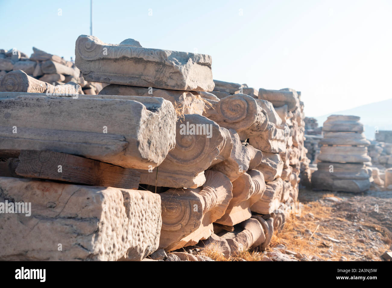 Old stone pillars lying on the ground at a building site Stock Photo ...