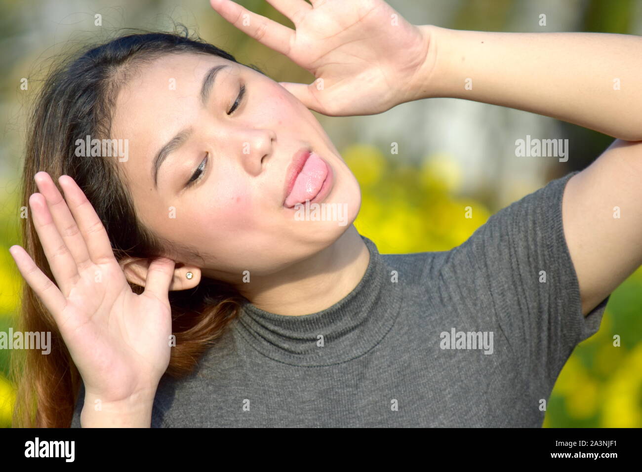 Woman Making Funny Faces Stock Photo - Alamy