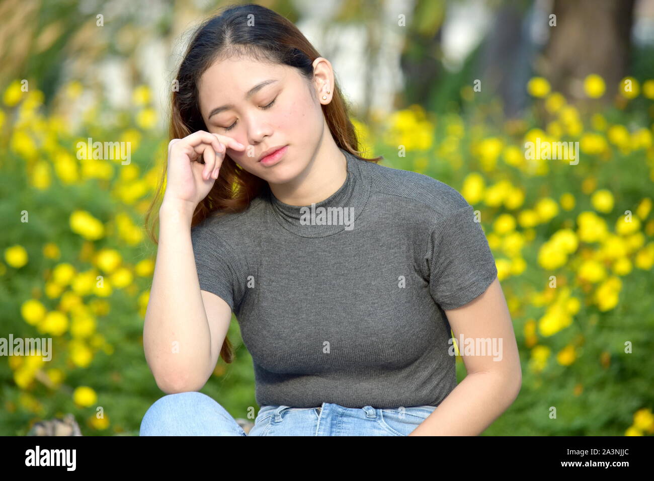 Crying Young Filipina Adult Female Stock Photo - Alamy