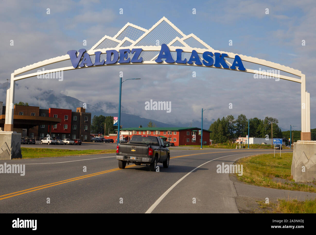 Sign at the entrance to Valdez Alaska on the Richardson Highway in the ...
