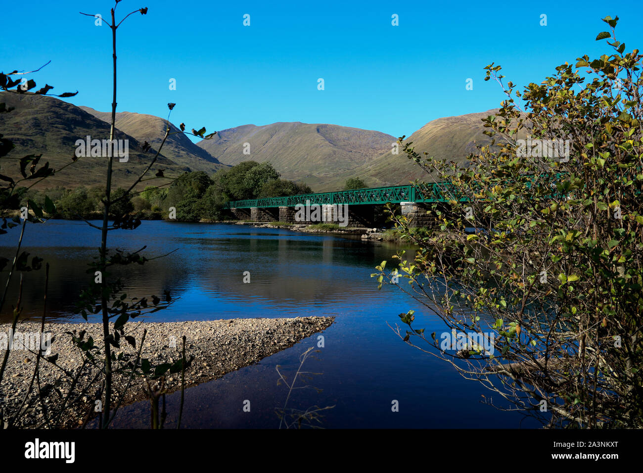 With some piers of a railroad bridge in the background hi-res stock ...