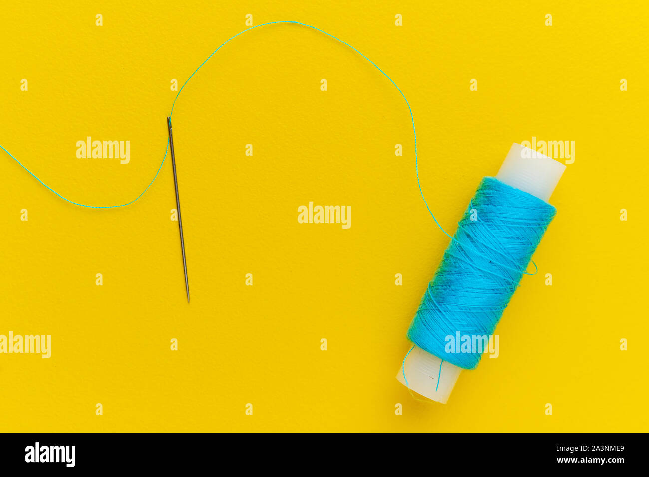 Thread Through Needle High Resolution Stock Photography and Images - Alamy