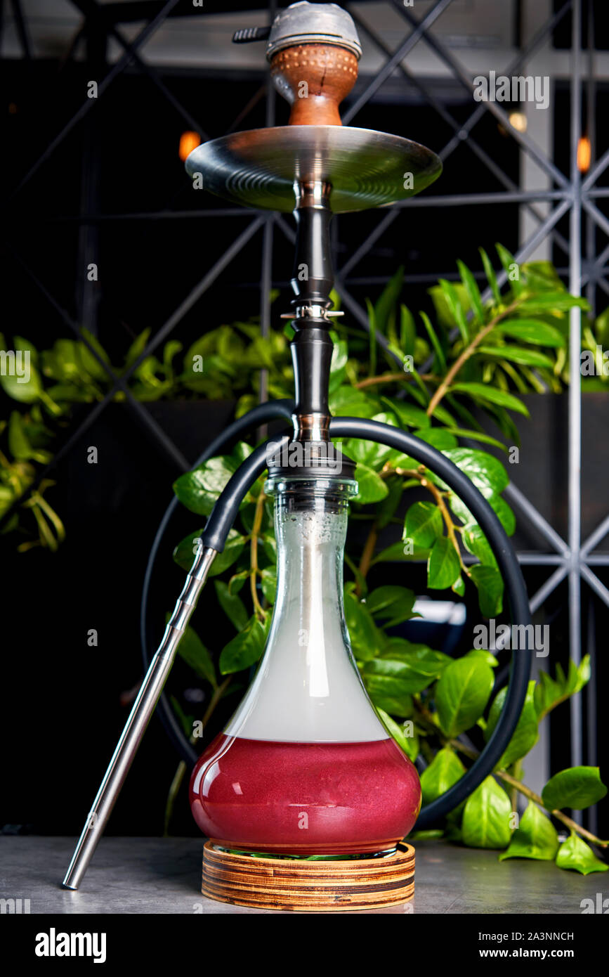 fragrant hookah in the smoke on the table Stock Photo - Alamy