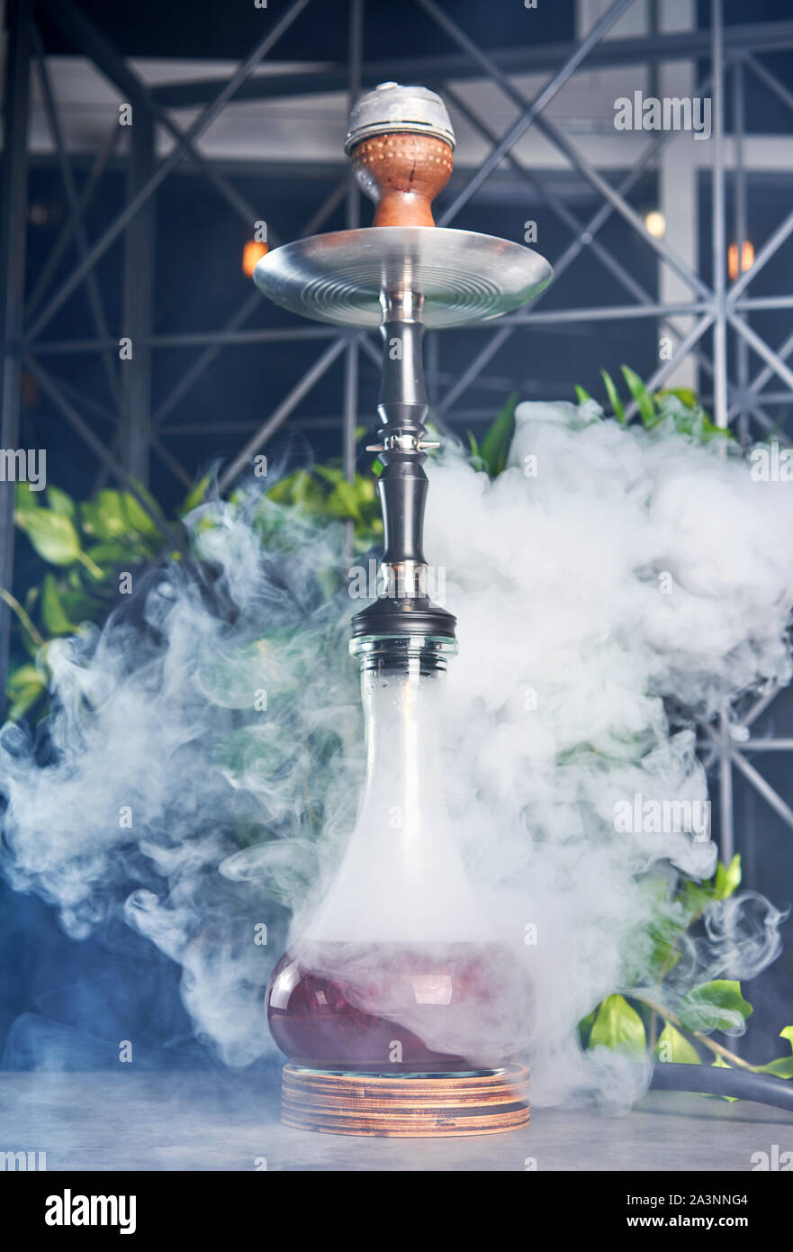 fragrant hookah in the smoke on the table Stock Photo - Alamy