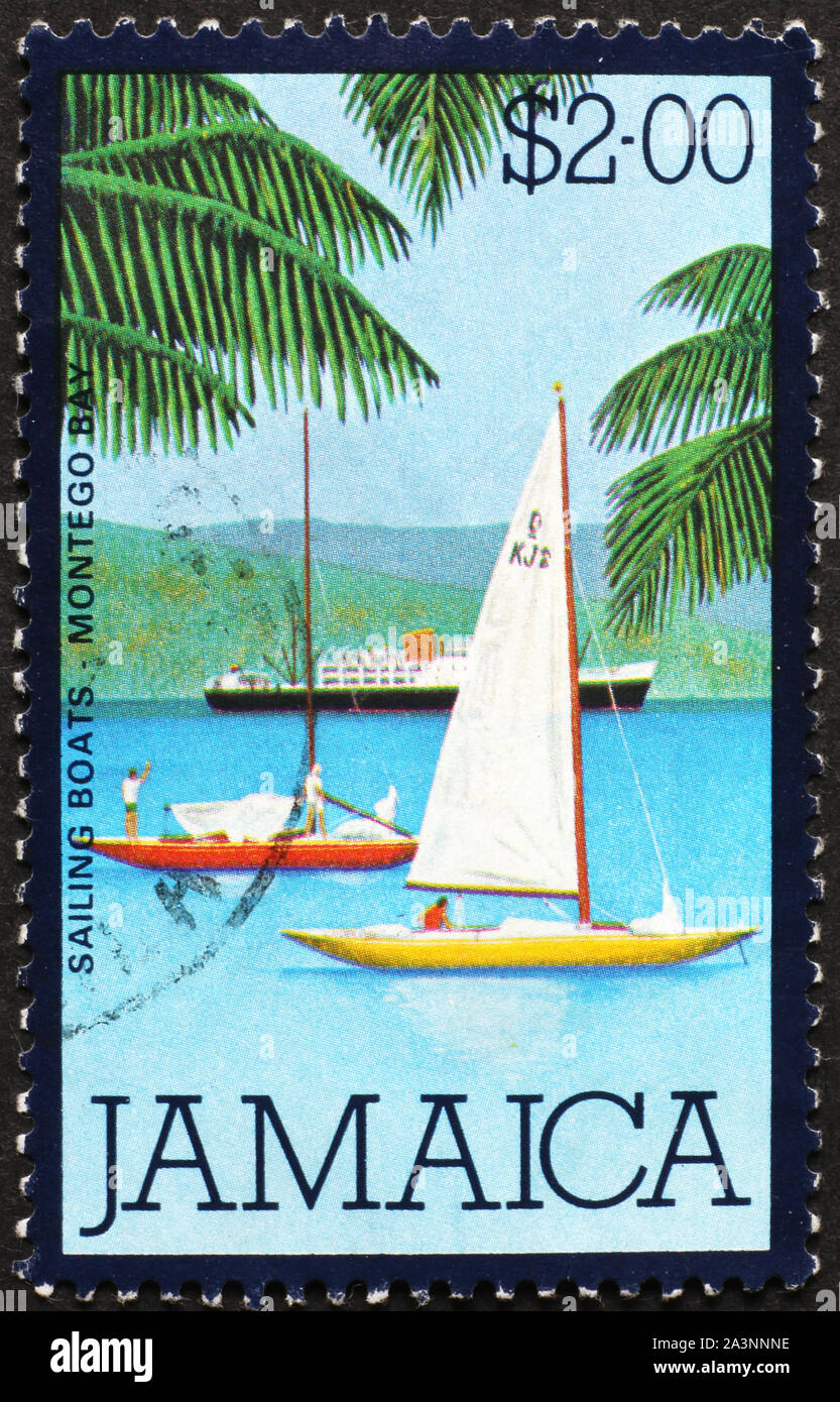 Sailing boats on jamaican postage stamp Stock Photo - Alamy