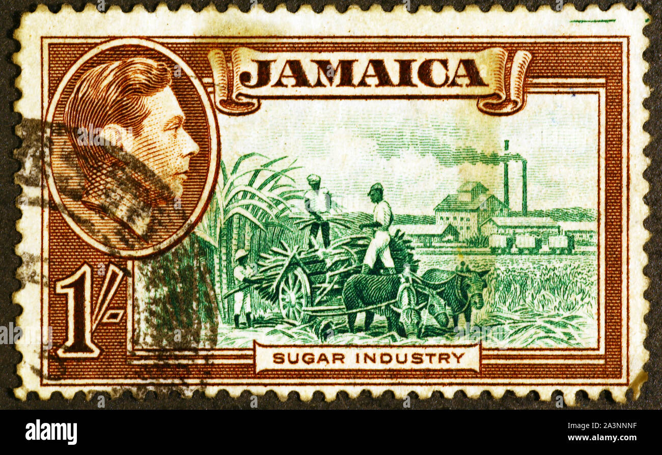 Sugar industry on vintage jamaican postage stamp Stock Photo - Alamy