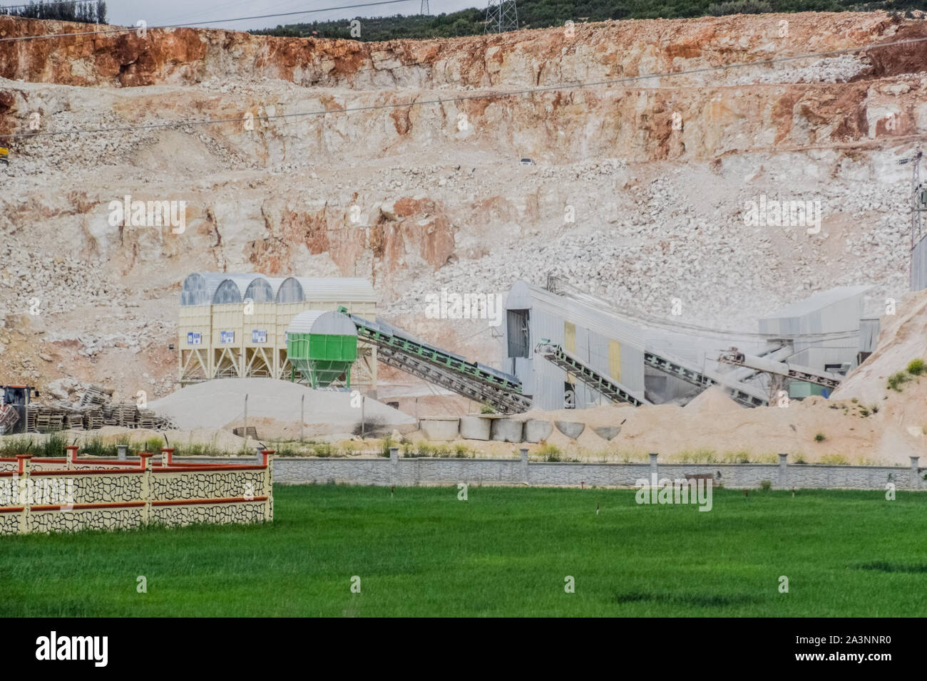Marble quarry quarrying white marble in an open pit Stock Photo - Alamy