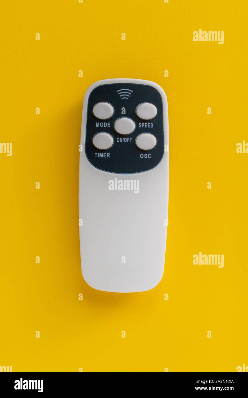 simple remote wireless controlle on the color background isolated top ...