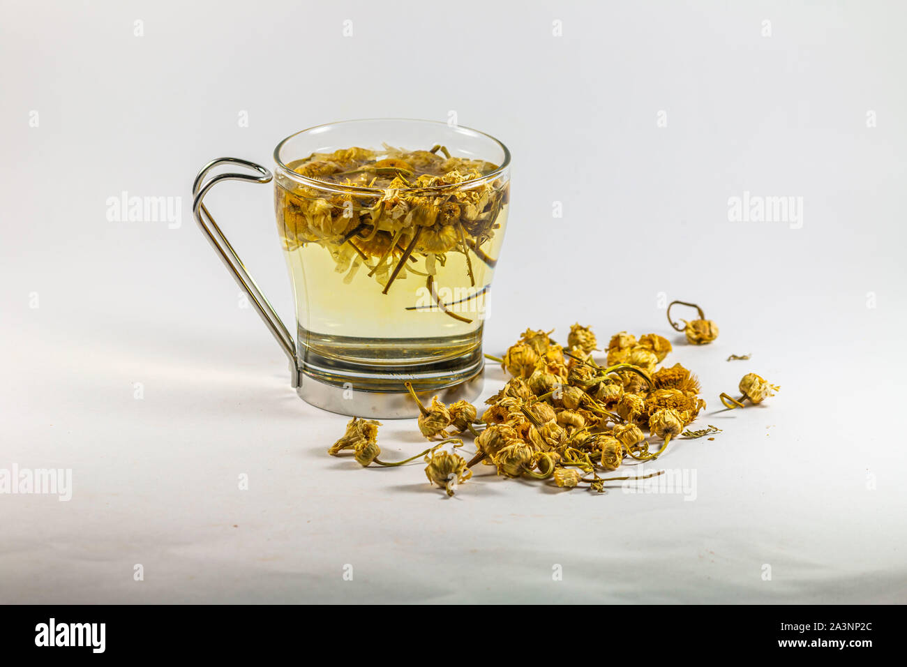 Natural chamomile tea in cup Stock Photo - Alamy