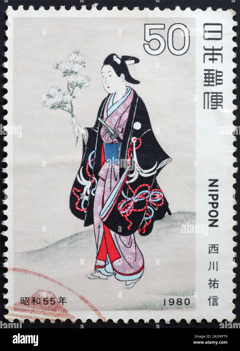 Japanese man traditionally dressed on postage stamp Stock Photo - Alamy