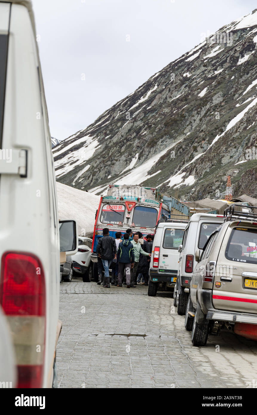 Traffic jams and extremely close crossing of trucks and vehicles due to ...