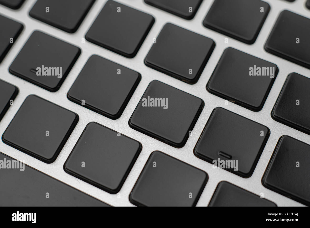 macro shot of empty blank keys on a keyboard without letter Stock Photo ...