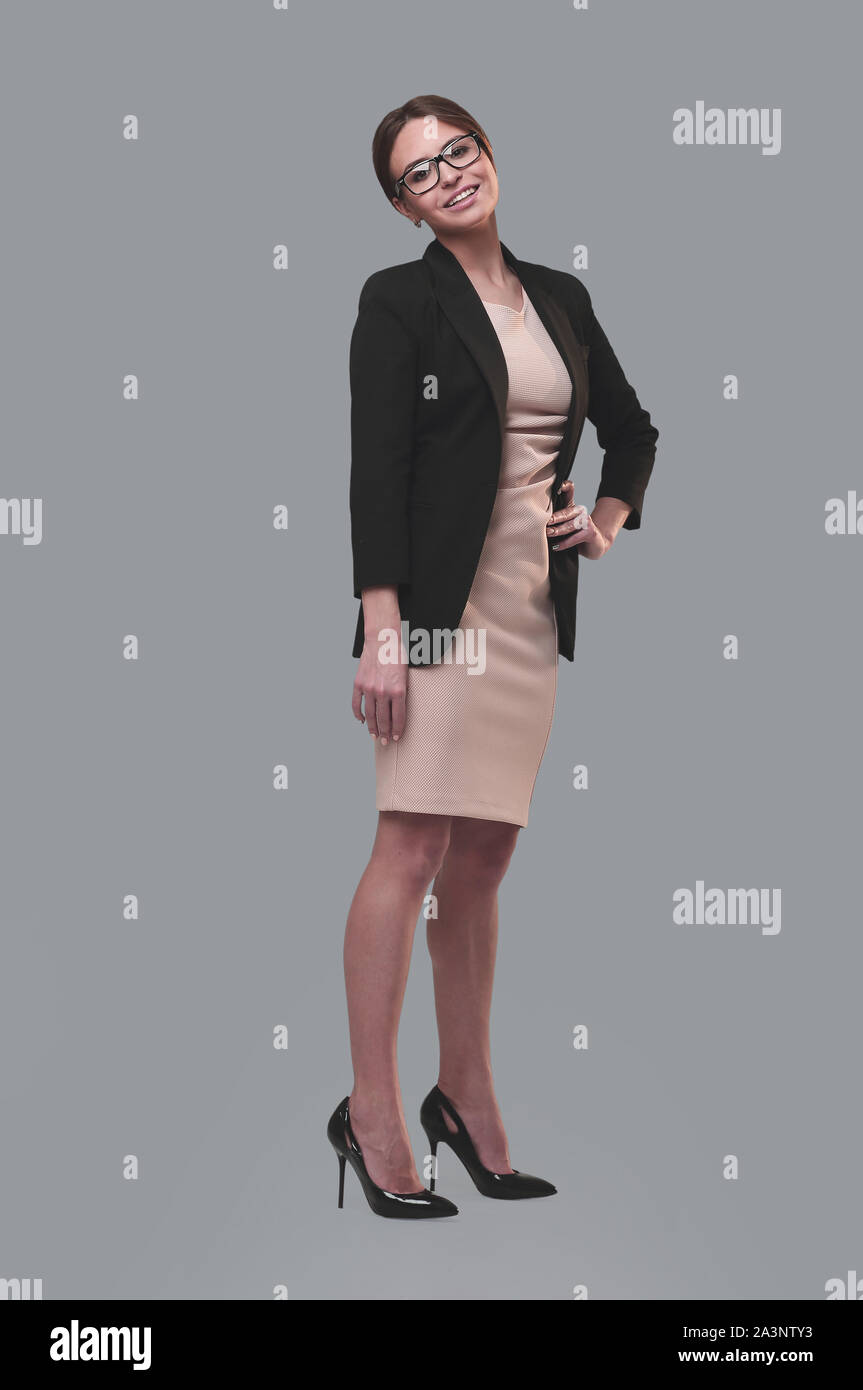 full length . portrait of a successful young business woman . isolated ...