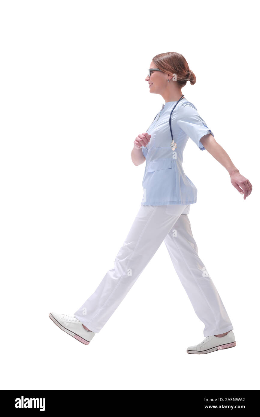 side view. confident medical doctor woman stepping forward . isolated ...