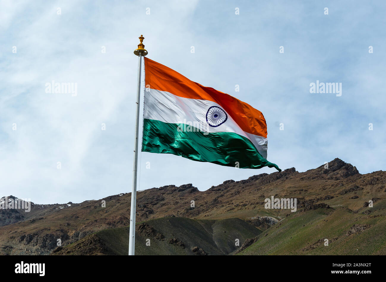 Indian tricolour flag against mountain peaks in the background at ...