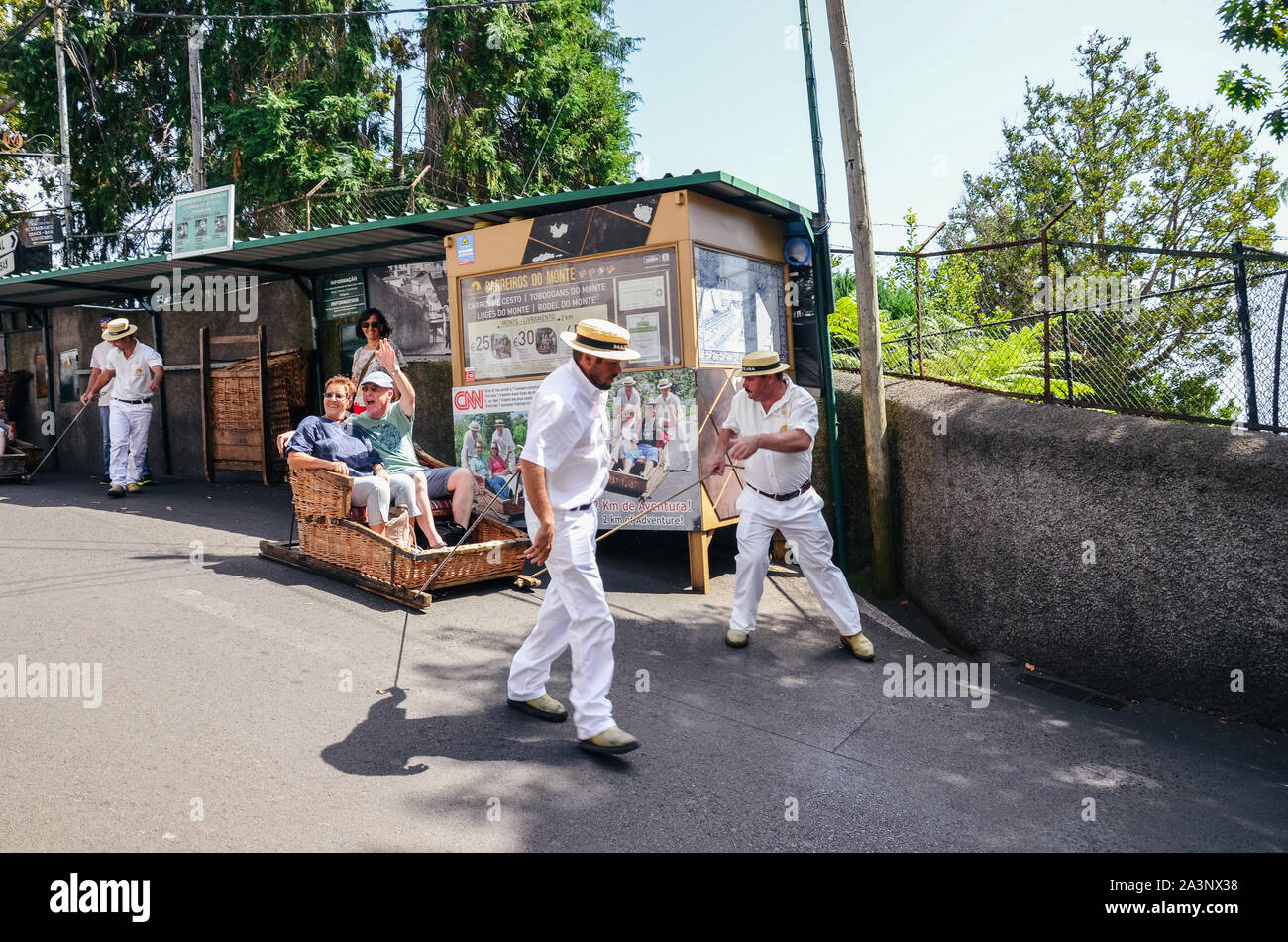 Monte, Madeira, Portugal - Sep 14, 2019: Wicker Basket Sledges drivers ...