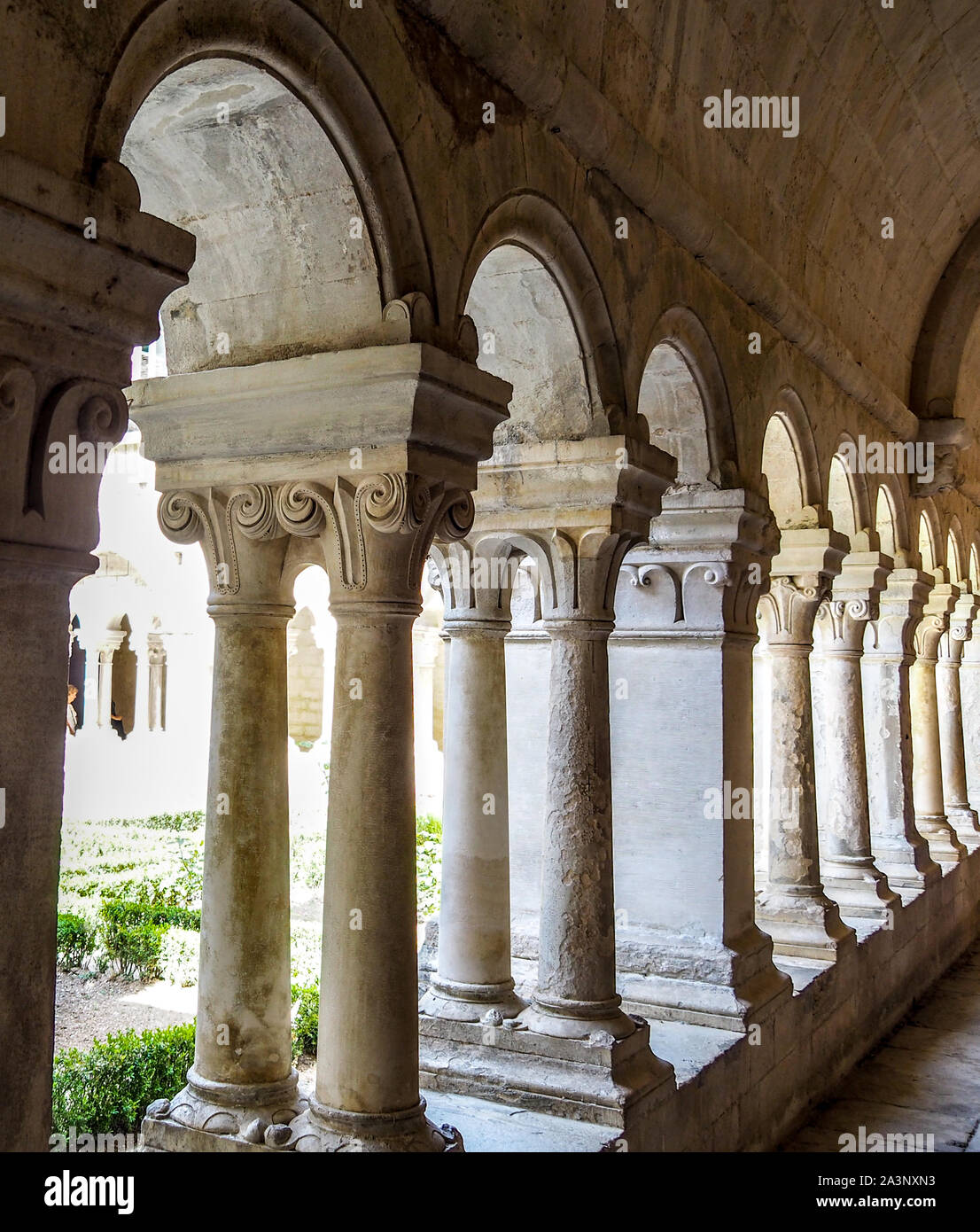 Arched columns of religious cloisters in southern France Stock Photo ...