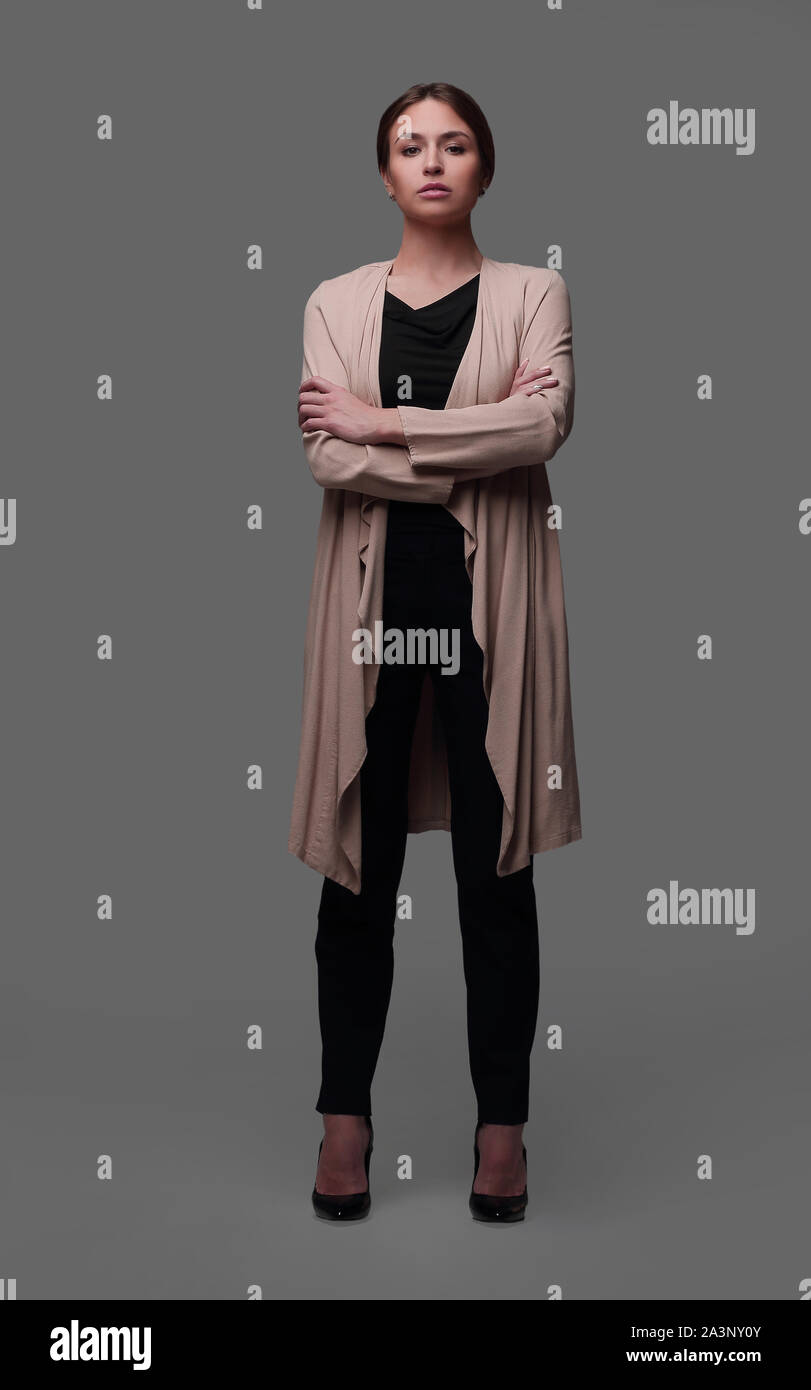 in full growth. portrait of a successful young woman . isolated on ...