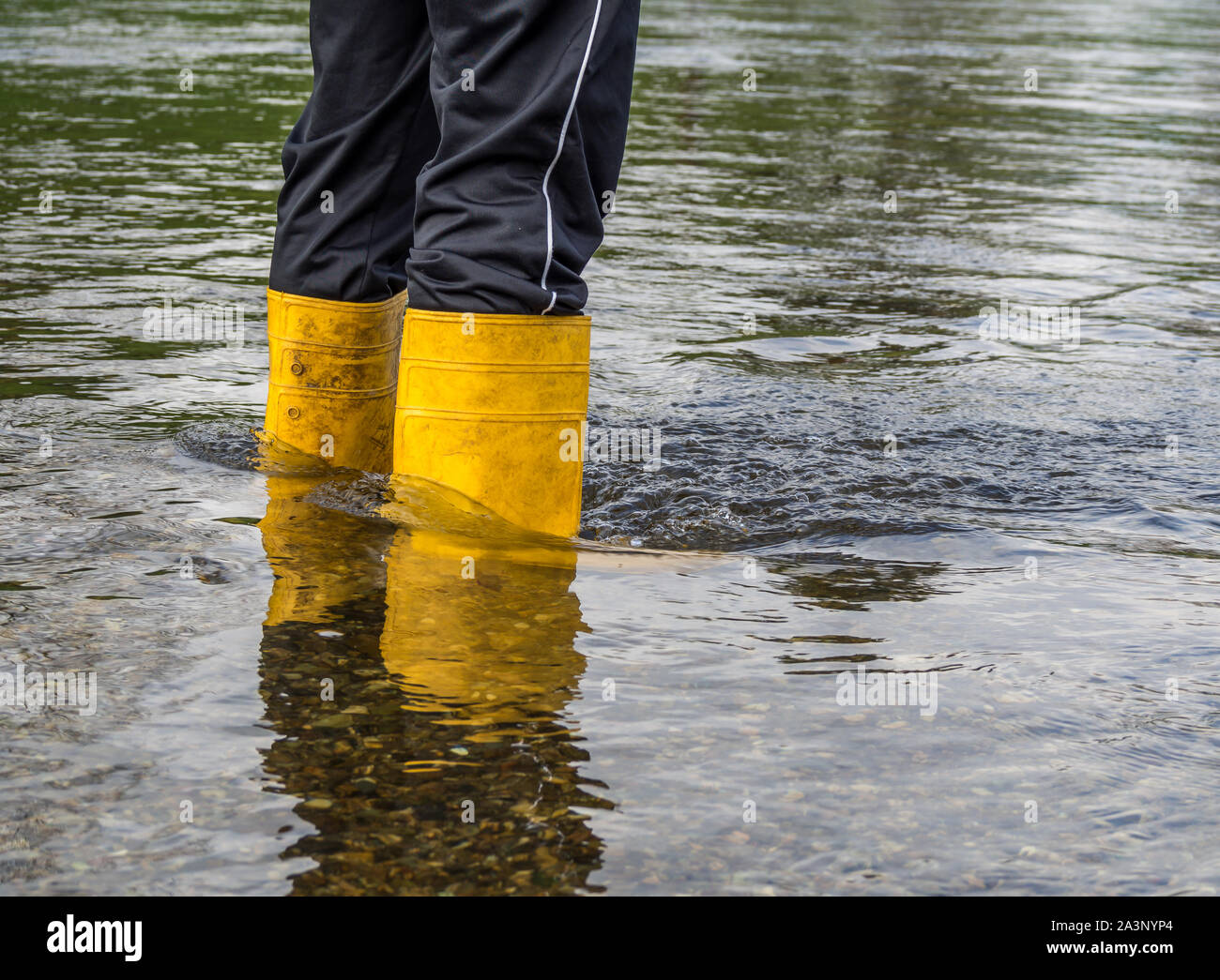 Boots in high water Stock Photo - Alamy