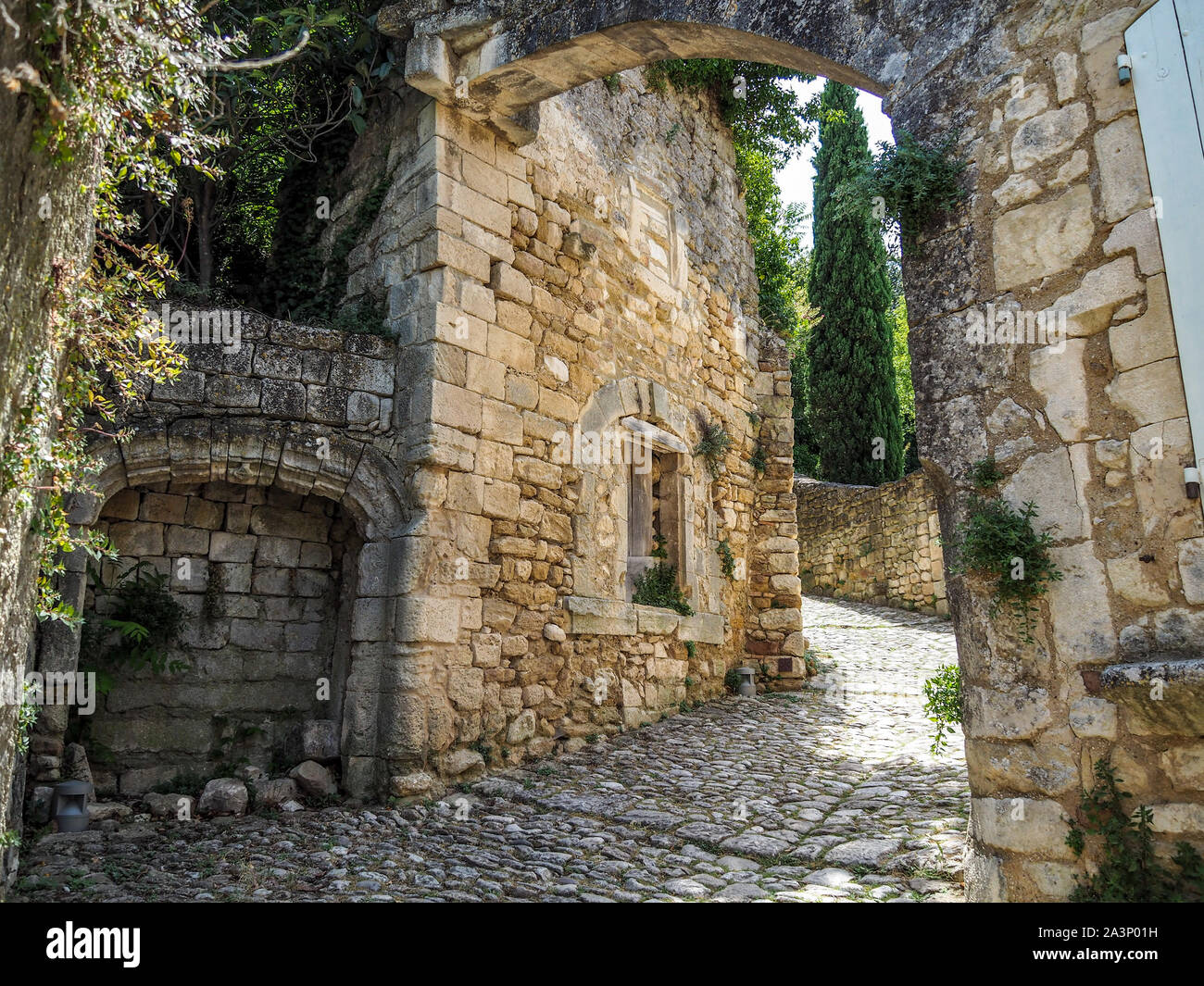 Ancient stone doorways in Oppede Le Vieux, France, Europe Stock Photo ...