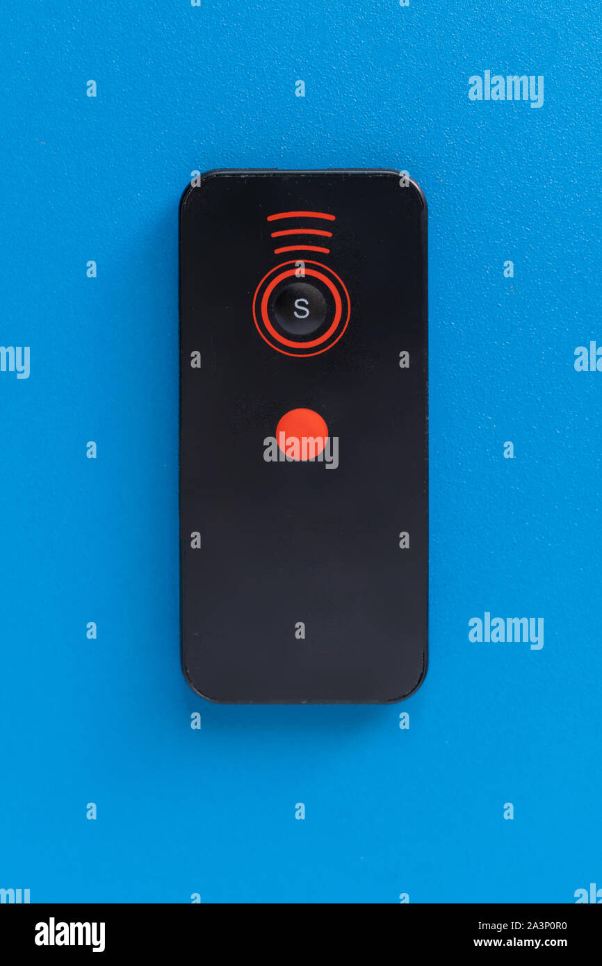simple remote wireless controlle on the color background isolated top ...