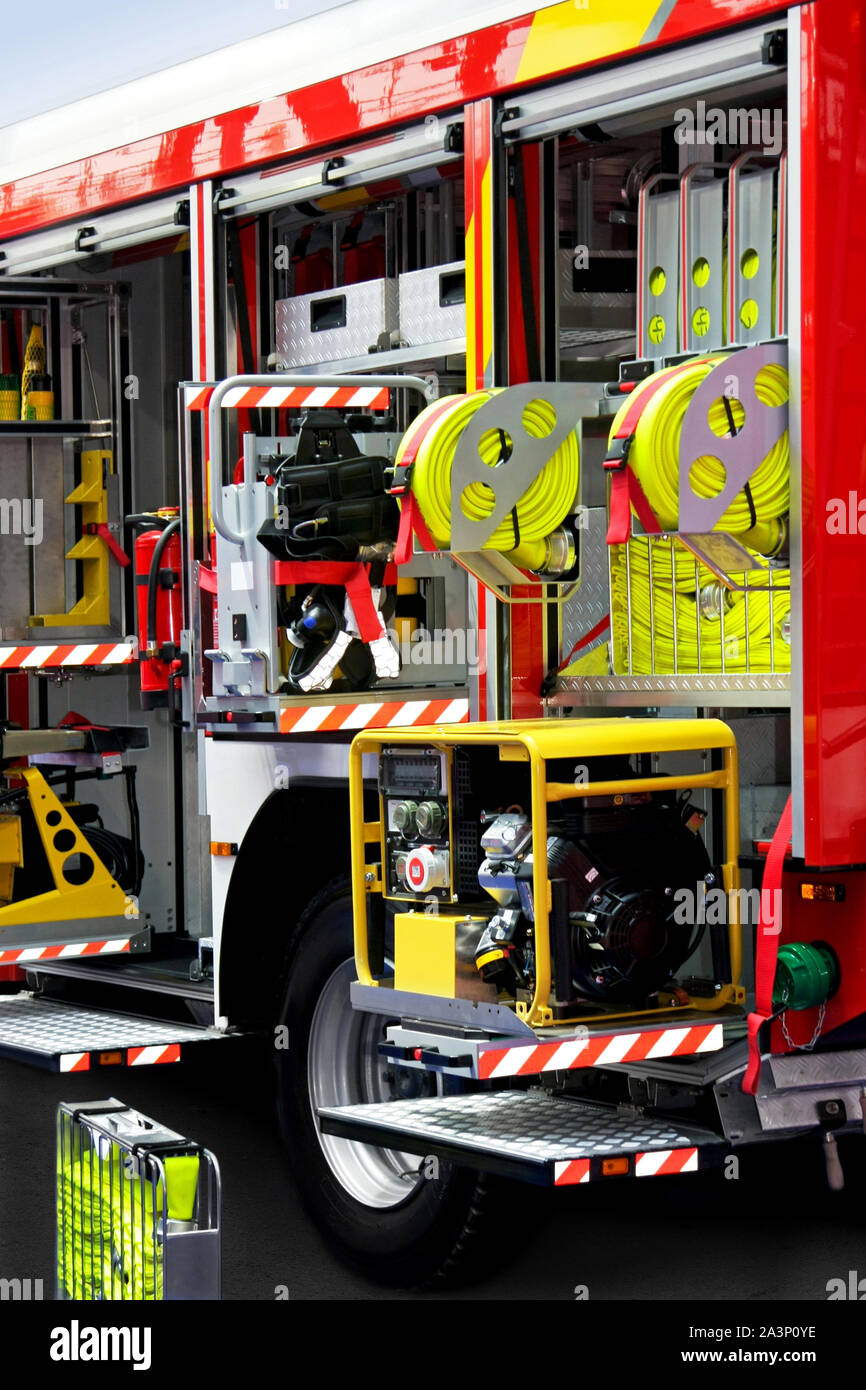 Fire engine truck with lot of rescue equipment Stock Photo - Alamy