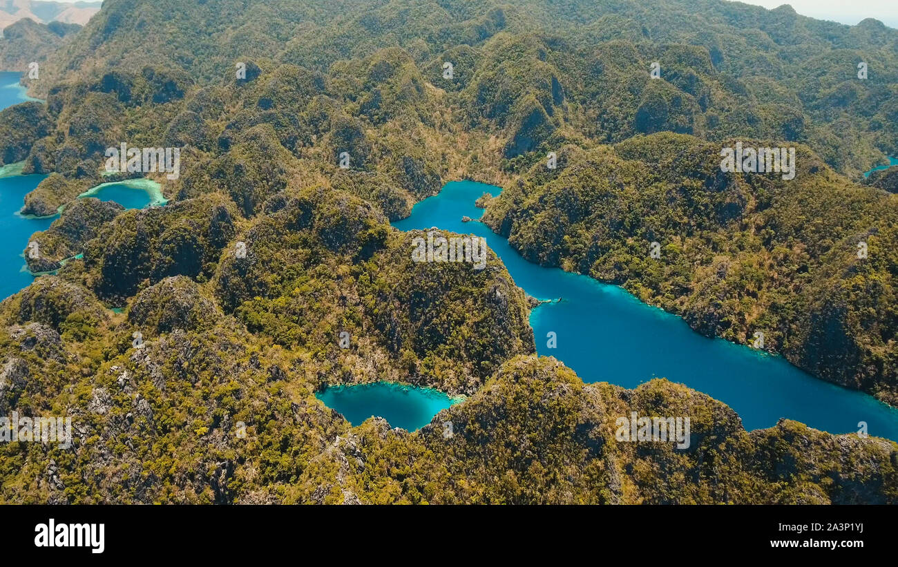 Aerial view:Mountain Kayangan lake,on a tropical island with blue water ...