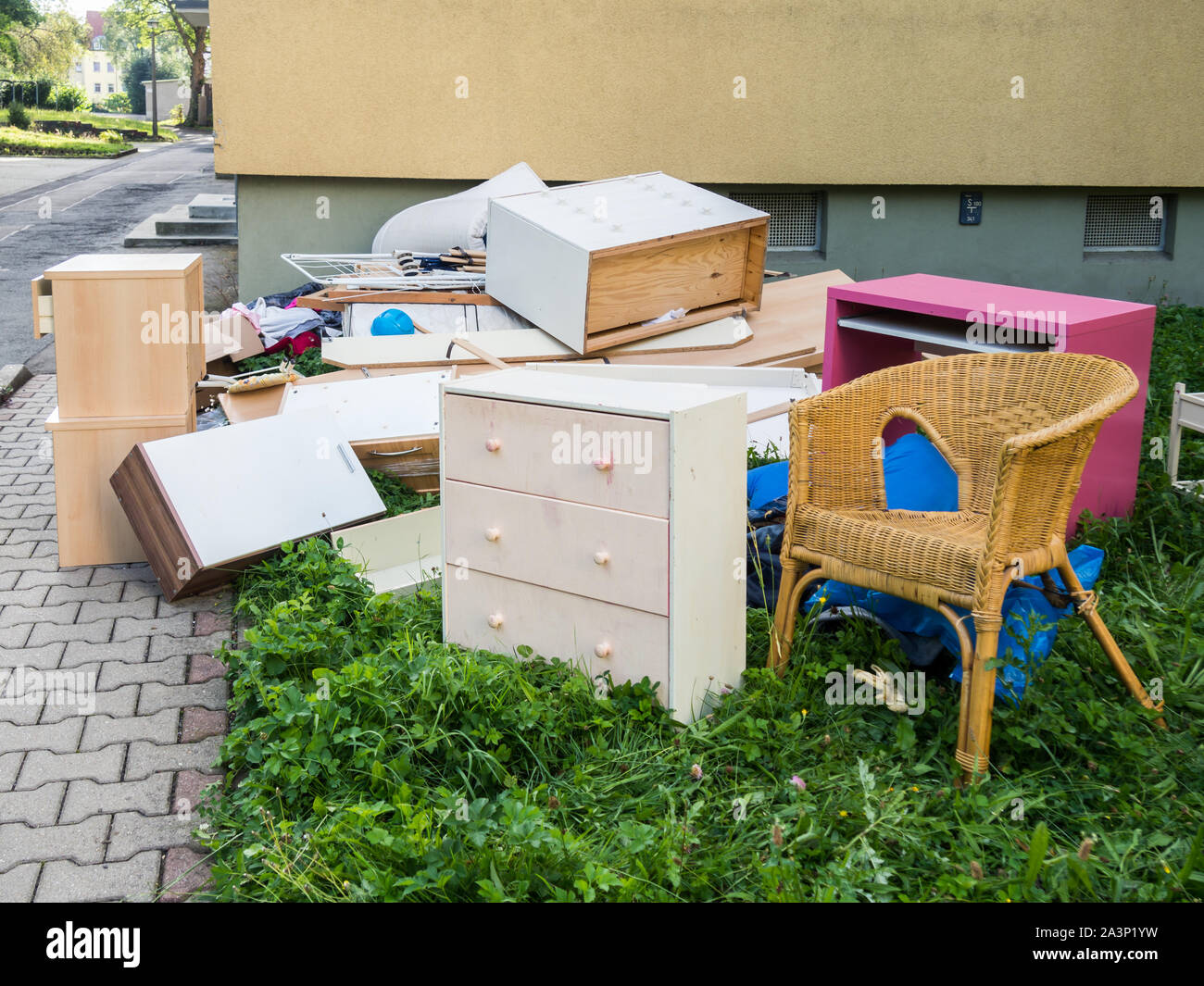 Bulky waste in front of the house Stock Photo - Alamy