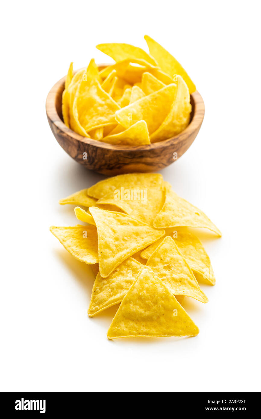 Corn nacho chips. Yellow tortilla chips in bowl isolated on white ...